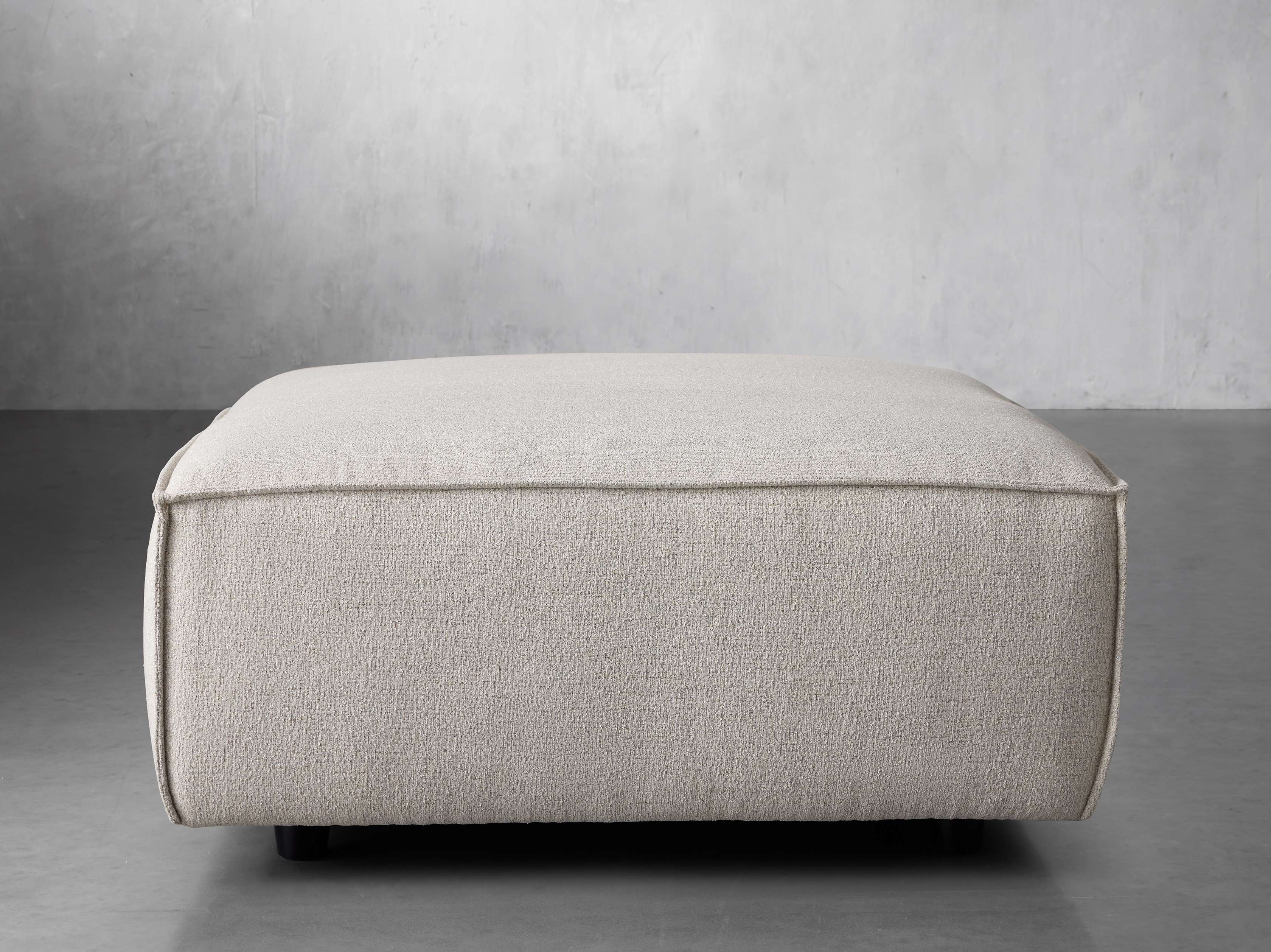 Coburn Ottoman in Upholstered Fabric in White Arhaus